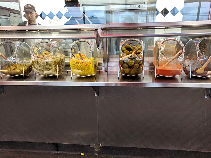 The topping station&mdash;where your sandwich destiny awaits in clear containers. Choose wisely, young Padawan.