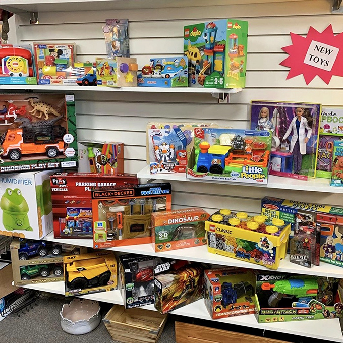 Toy section that proves one child's outgrown treasure becomes another's brand-new adventure. LEGO sets with stories already built in!