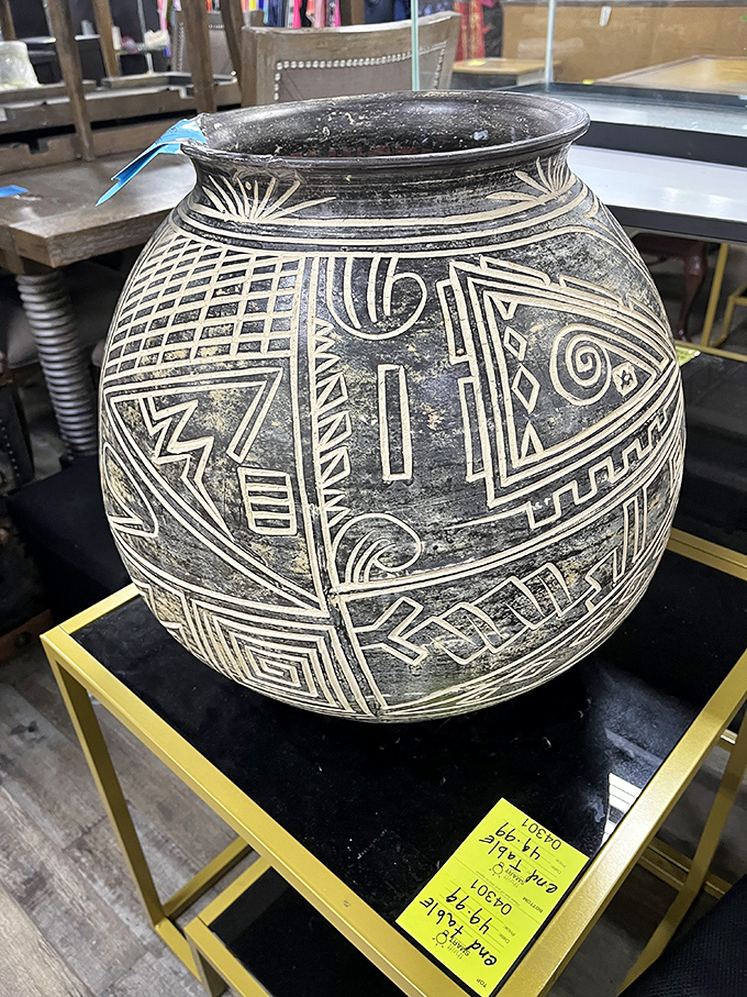 Ancient geometry meets modern decor! This tribal-carved pot isn't just a vessel&mdash;it's functional artwork with stories etched into every line.