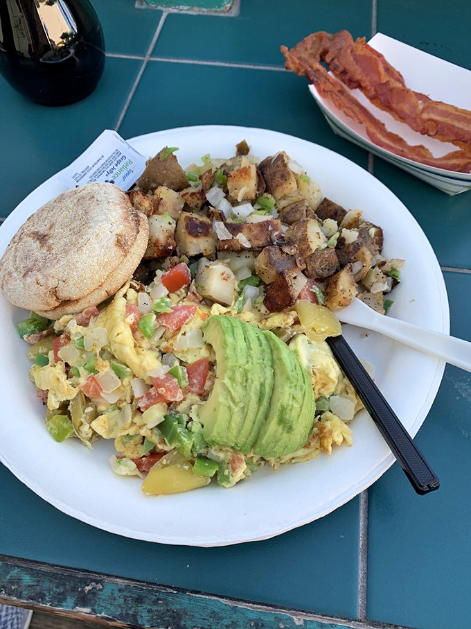 The veggie scramble that proves vegetables can party too&mdash;a colorful fiesta of eggs, avocado, and potatoes that even carnivores secretly covet.