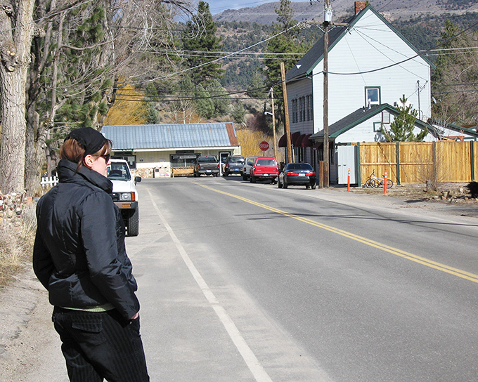 A quiet moment on Main Street, where the mountains stand guard and time moves at the civilized pace of a leisurely stroll.