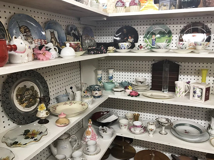 Plates, teacups, and serving pieces arranged like a ceramic family reunion &ndash; each piece with stories of dinners past.