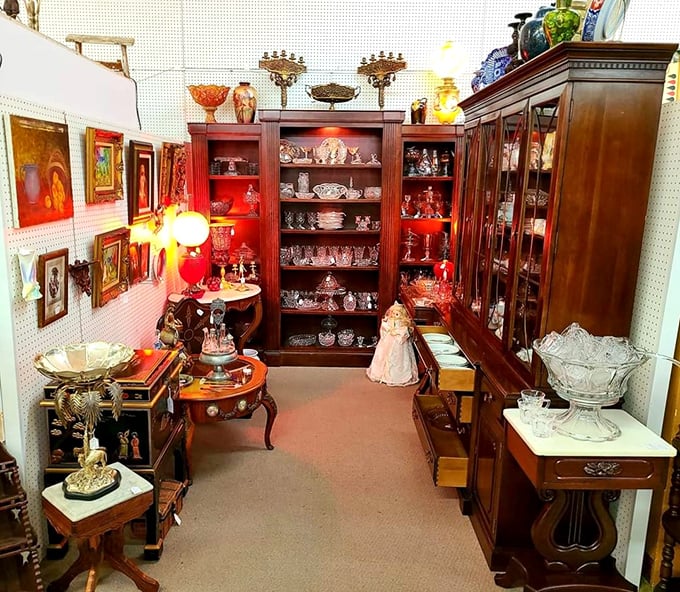 Step into this elegant vignette where crystal catches light like diamonds and mahogany furniture creates a stage for entertaining that Instagram could never capture.