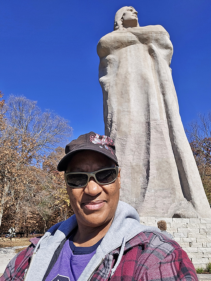 The statue's imposing presence provides perfect perspective&mdash;we humans are just temporary visitors in this ancient landscape.