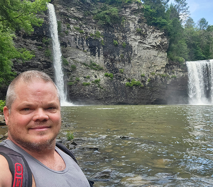 The waterfall creates its own microclimate of mist and wonder, a natural air conditioner that's been cooling hikers since long before electricity.