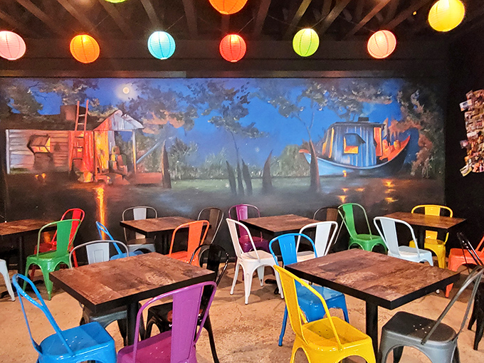 Dining under a rainbow of lanterns with rustic murals transports you somewhere between summer camp and an artist's dreamscape.