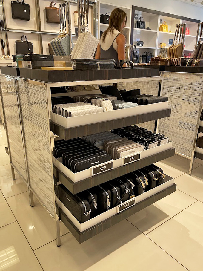 Designer wallets arranged with mathematical precision. The perfect leather companion for your cards is hiding in plain sight.