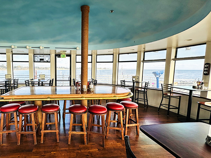 Floor-to-ceiling windows framing the Pacific &ndash; nature's own IMAX screen, no ticket required.