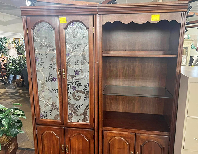 This elegant china cabinet with etched glass doors is just waiting to display your collection of "I'm totally going to use these someday" special occasion dishes.