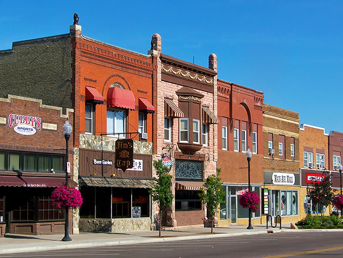 Coastal charm surrounds you in Brookings, where colorful historic storefronts and vibrant flower baskets line your sunny walk through downtown.