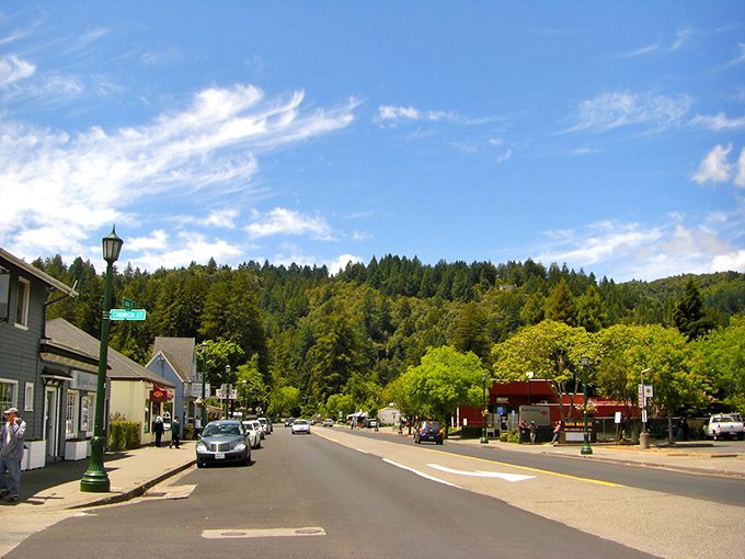 Guerneville's main street is framed by towering redwoods, where small-town charm meets majestic natural beauty.