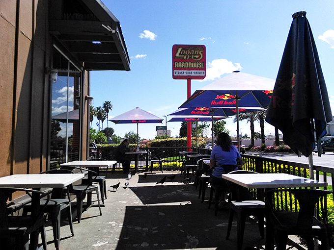 That roadhouse patio promises good times, cold drinks, and steaks grilled exactly how you like them.