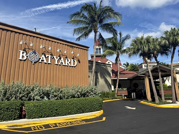 Nautical sophistication! Boatyard's perfectly manicured entrance with swaying palms promises the upscale waterfront dining experience Fort Lauderdale is famous for.