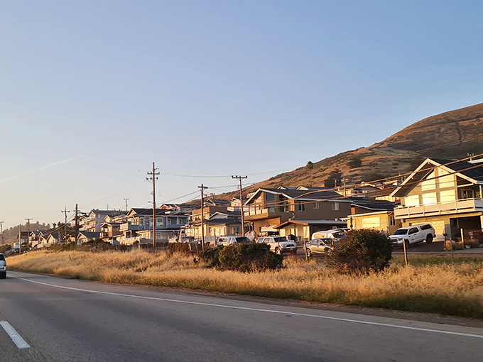 Golden hour light bathes these beach houses in warmth, creating the perfect end to any day.