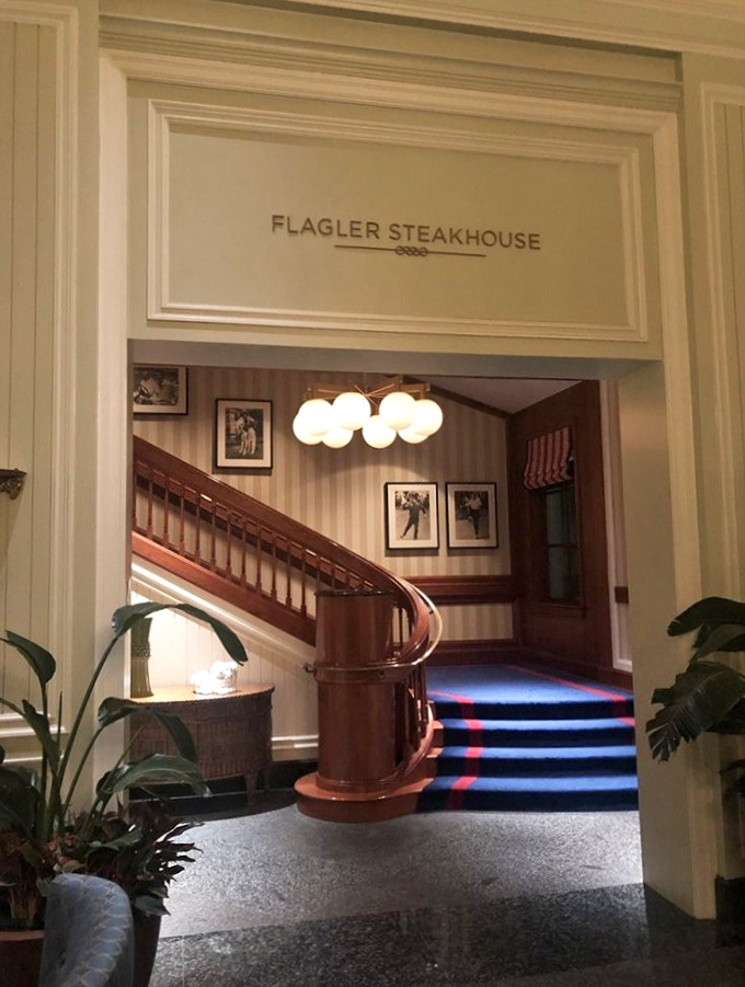 Flagler's elegant entryway looks like it belongs in a mansion, not a restaurant. Those globe lights aren't just illumination&mdash;they're spotlights for the star of the show: steak.