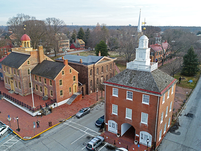 Historic New Castle's brick buildings stand proudly, where centuries of stories unfold affordably today.