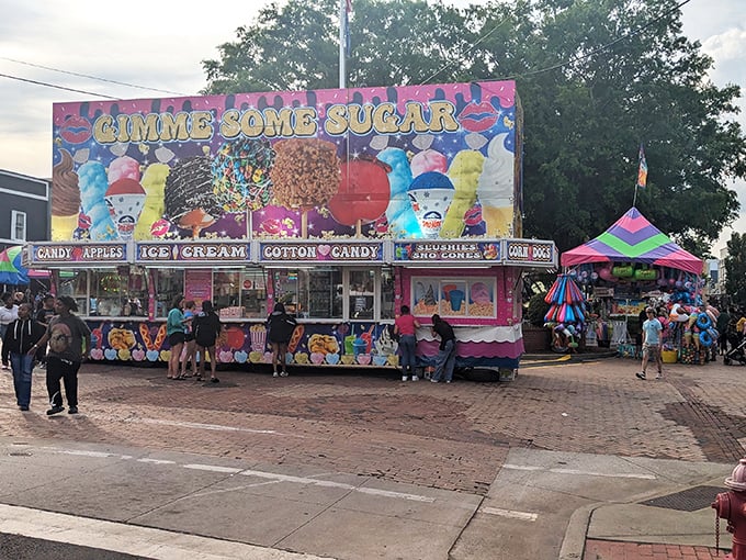 Nothing says "small-town festival" like a sugar-high inducing food stand. Diet plans come here to die gloriously amid cotton candy clouds.
