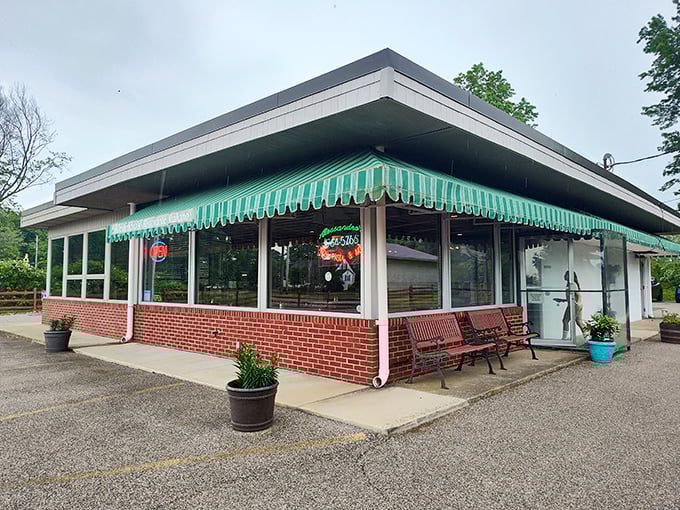This unassuming diner with its distinctive green awning has likely witnessed more local gossip than a lifetime subscription to People magazine.