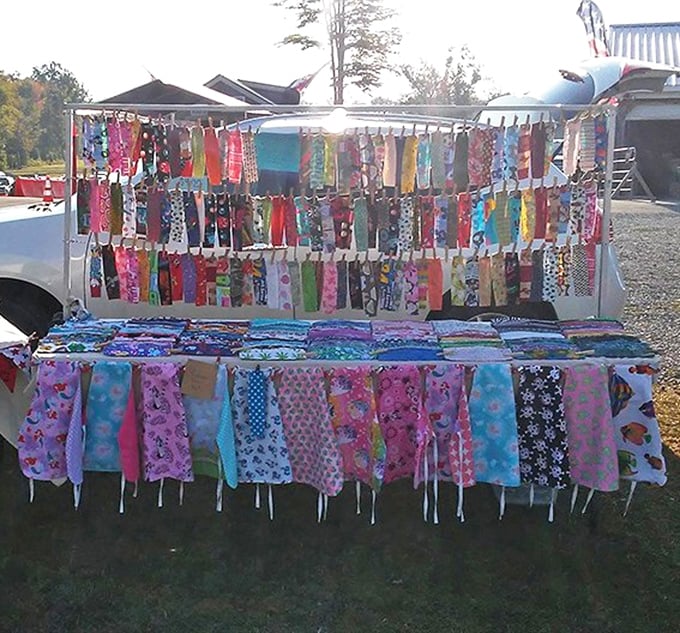 A rainbow of fabric practicality flutters in the Ohio breeze. These aren't just kitchen linens&mdash;they're time machines to grandmother's Sunday dinners.