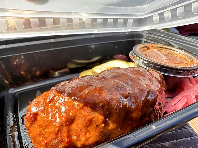 A sauce-slathered creation that looks like it belongs in the Barbecue Hall of Fame. Glistening with promise and smoky potential.