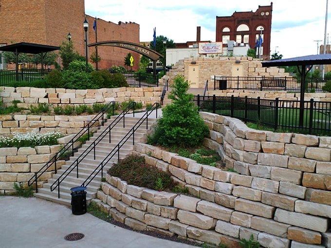 Ashland Plaza's terraced stonework creates an urban oasis where concrete jungle meets actual nature in perfect harmony.