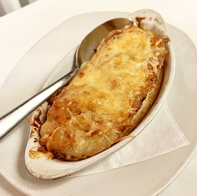 Cheese, bubbling like molten gold over tender potatoes. This isn't a side dish&mdash;it's the supporting actor that steals the scene.