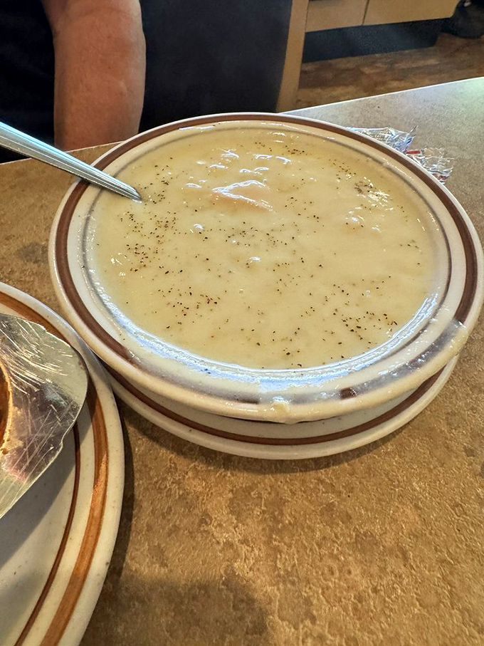 Avgolemono soup that could cure whatever ails you. This lemony Greek penicillin is comfort in a bowl, no prescription required.