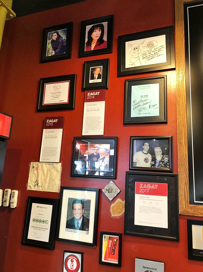 Each framed accolade tells a story of smoke and patience. This wall of fame isn't bragging; it's documenting a delicious history.