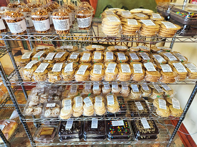 Cookie heaven exists, and it's on this metal shelf. Rows of perfectly arranged treats standing at attention, awaiting their delicious deployment.