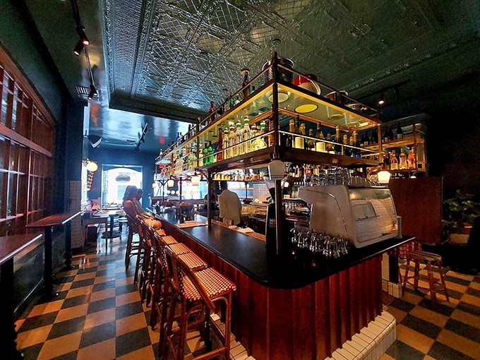 That illuminated bar isn't just storing bottles&mdash;it's showcasing liquid possibilities that pair perfectly with everything coming out of the kitchen.