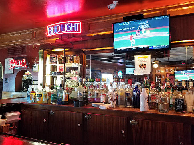 A bar stocked for serious business&mdash;where neon beer signs provide the ambiance and cold drinks flow with reassuring regularity.