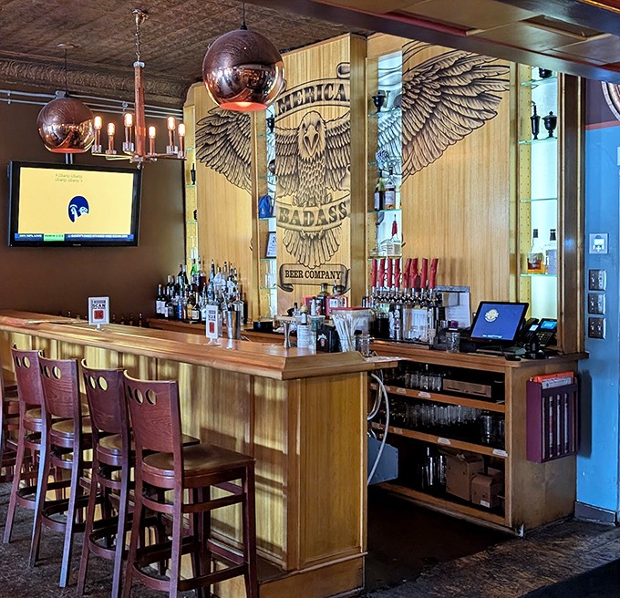 The bar showcases Michigan's impressive craft beer scene, with taps that rotate more frequently than the Detroit Lions' coaching staff.