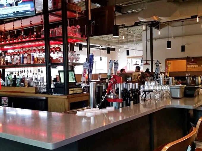 A well-stocked bar that takes its beverages as seriously as its burgers. Where craft beers flow and cocktails are mixed with precision rather than pretension.