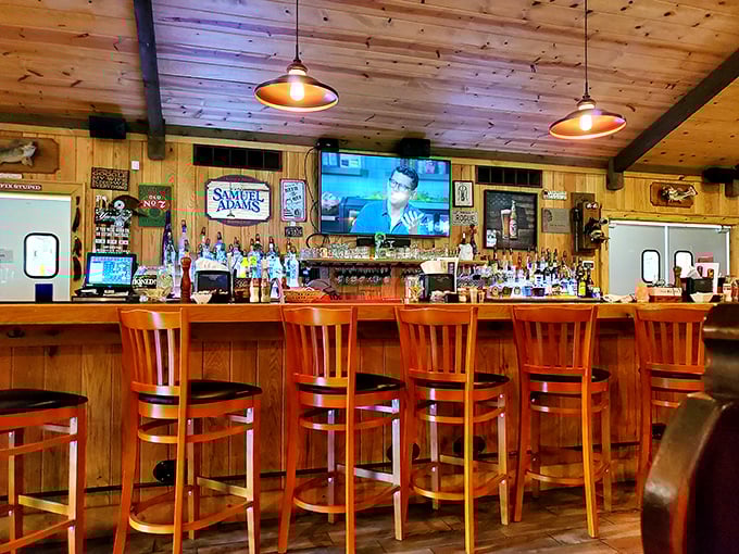 Bar seating offers front-row views of the impressive spirits collection. Those copper-toned chairs practically beg you to settle in for the evening.
