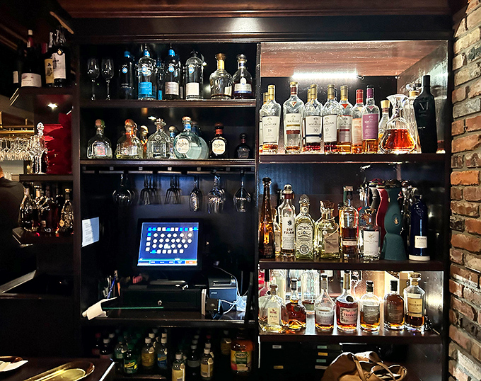 The bar's impressive spirits collection stands ready to complement your meal or provide liquid courage before ordering that 32-ounce Tomahawk.