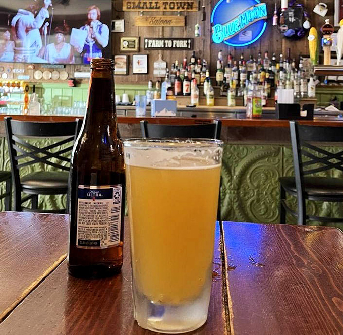 The bar's warm wooden surfaces and well-stocked shelves create that "everybody knows your name" atmosphere that keeps locals coming back.