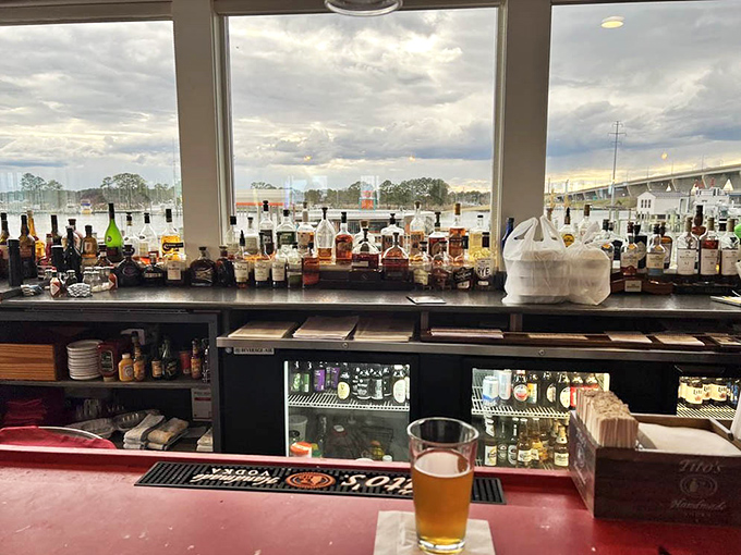The bar's panoramic view of the bay makes even waiting for a table feel like part of the experience rather than a delay.