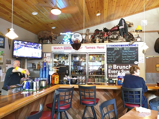 The heart of Pier 87's operation. That illuminated bar glows like a beacon of hospitality, promising good times and better stories to take home.