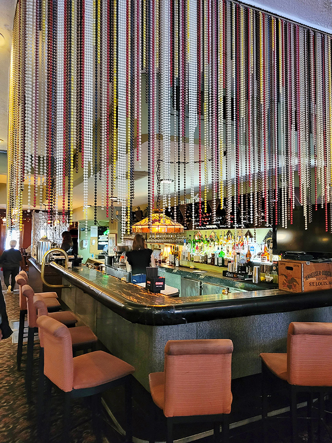 Beaded curtains shimmer in the bar light &ndash; a touch of mid-century glamour that makes ordering a Manhattan feel like the most natural thing in the world.