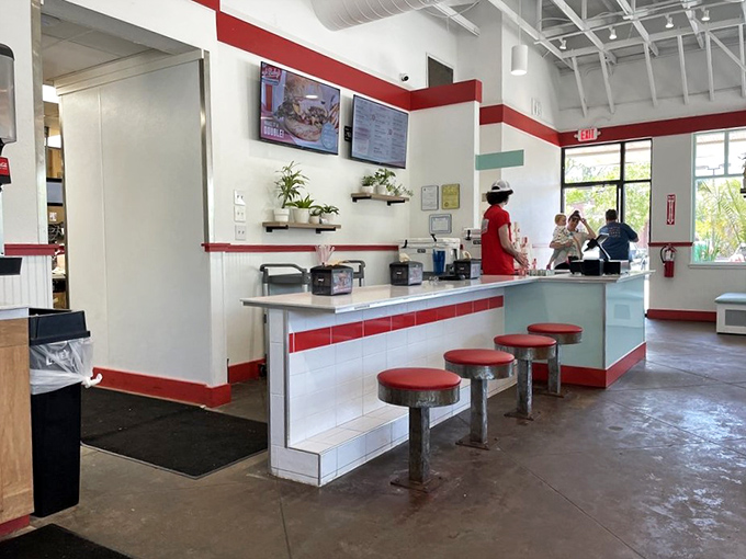 Those classic diner-style stools aren't just seating&mdash;they're front-row tickets to the culinary show happening behind the counter.