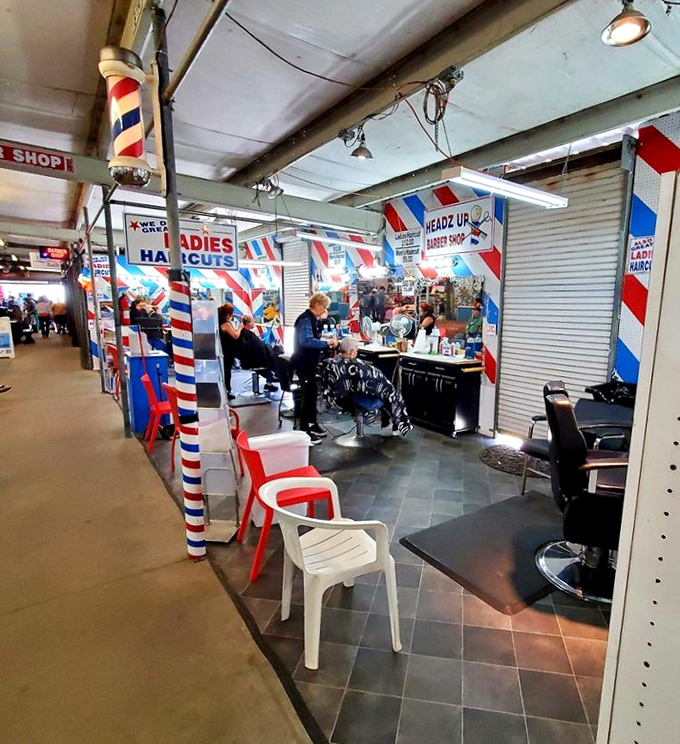 Old-school barbershop where haircuts come with free conversation and the striped poles promise a proper trim without fancy salon prices.