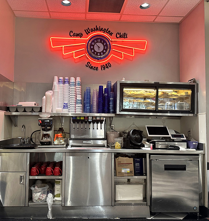 Behind the scenes magic happens here. That neon sign isn't just decoration &ndash; it's a promise of 24-hour deliciousness.