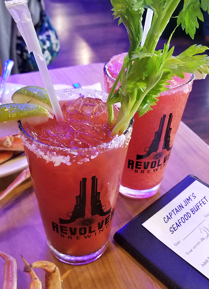 Bloody Marys garnished with celery stalks—because sometimes your vegetables should come with vodka and a salted rim. The perfect seafood companion.