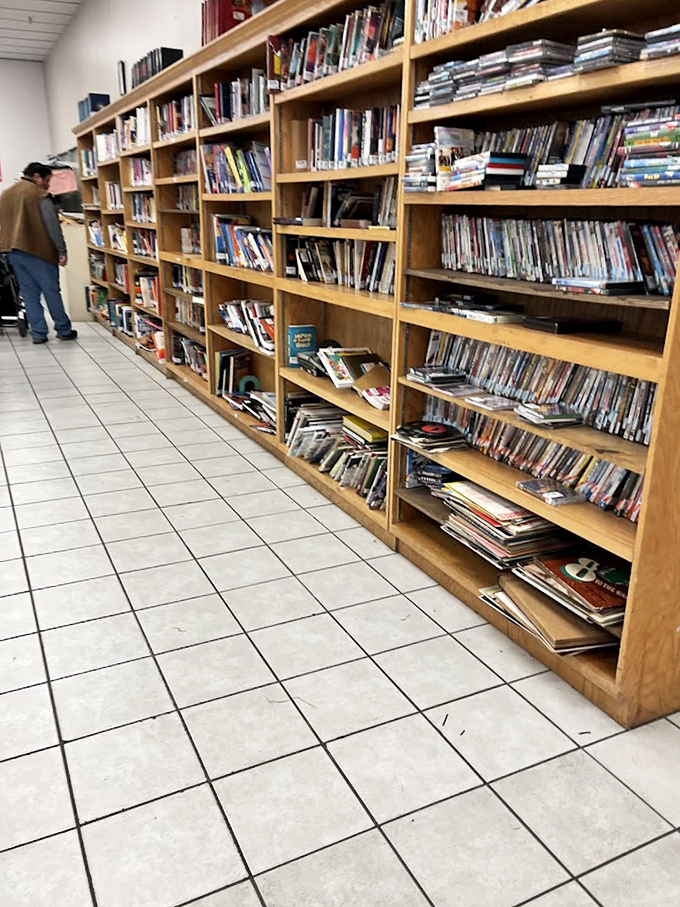 The literary corner: where paperbacks find new homes and DVD collections remind us of pre-streaming days. Bibliophile heaven at bargain basement prices.