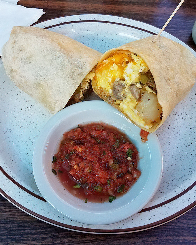 Breakfast burrito perfection &ndash; where eggs, cheese and potatoes meet in harmony, with salsa that adds just enough kick to wake up your taste buds.