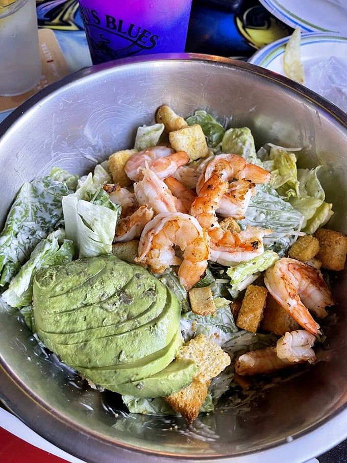 A Caesar salad that actually deserves its imperial name &ndash; fresh, abundant, and topped with perfectly grilled shrimp. No assassination worries here.