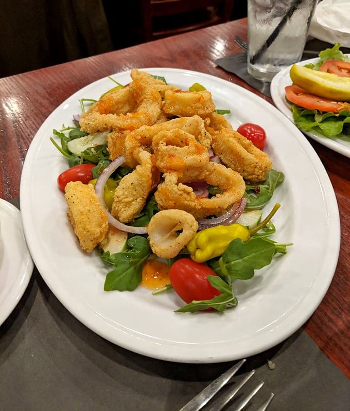 This calamari salad proves that sometimes fried seafood and greens can have a beautiful relationship—crispy, fresh, and never boring.