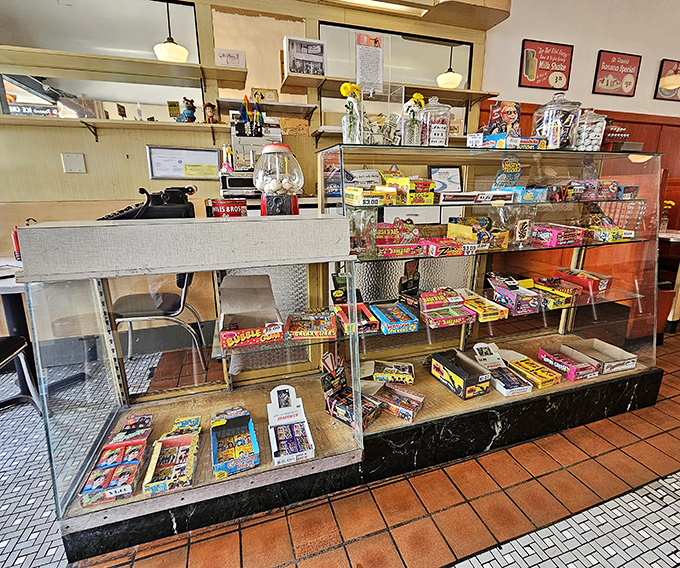 The candy display case is childhood nostalgia under glass&mdash;featuring treats that remind you of simpler times when sugar was the solution to everything.