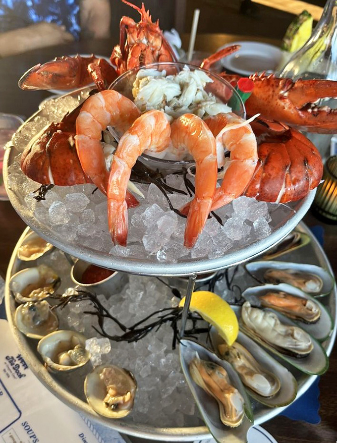 The seafood tower that makes skyscrapers jealous. A multi-story monument to the ocean's bounty that demands to be photographed first.
