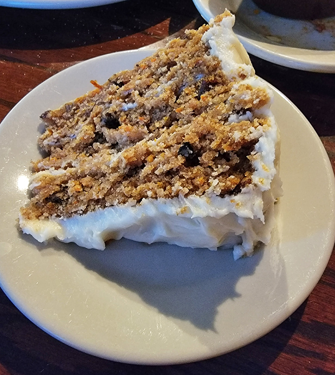 Carrot cake that makes you believe vegetables can be dessert. Layers of spiced cake and cream cheese frosting that would make your grandmother both proud and jealous.